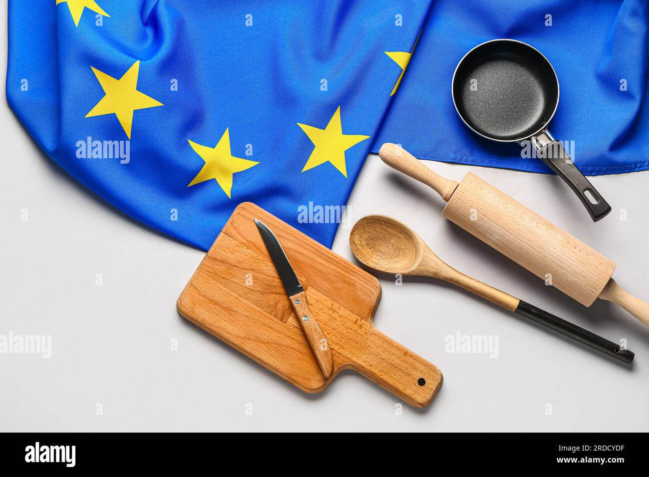 Flag of European Union with kitchen utensils on grey background Stock ...