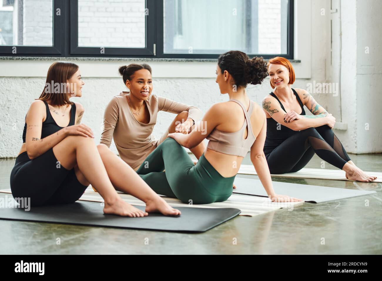 diverse group of happy and smiling multiethnic female friends in ...