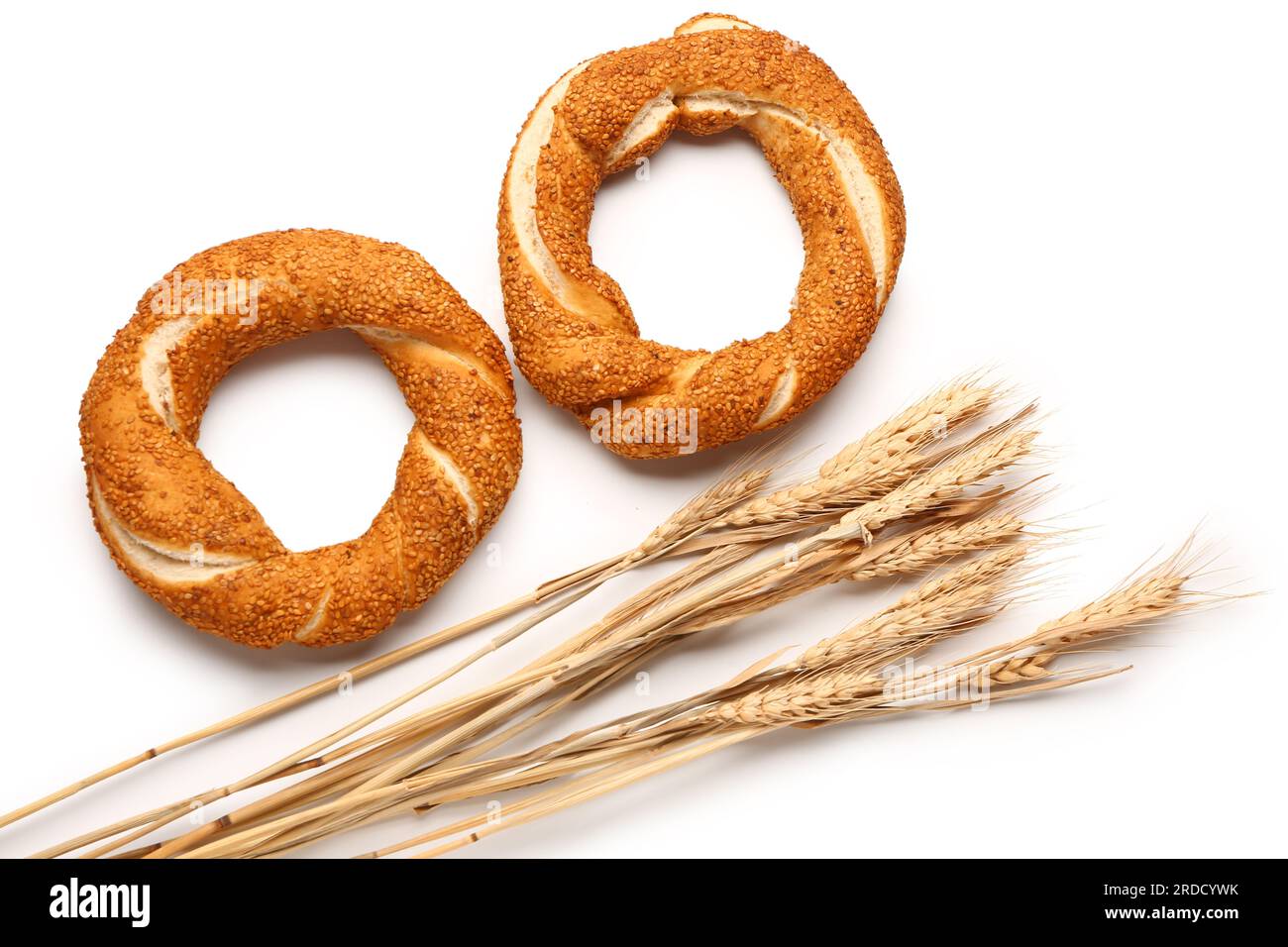 Fresh Turkish bagels and wheat ears isolated on white background Stock ...
