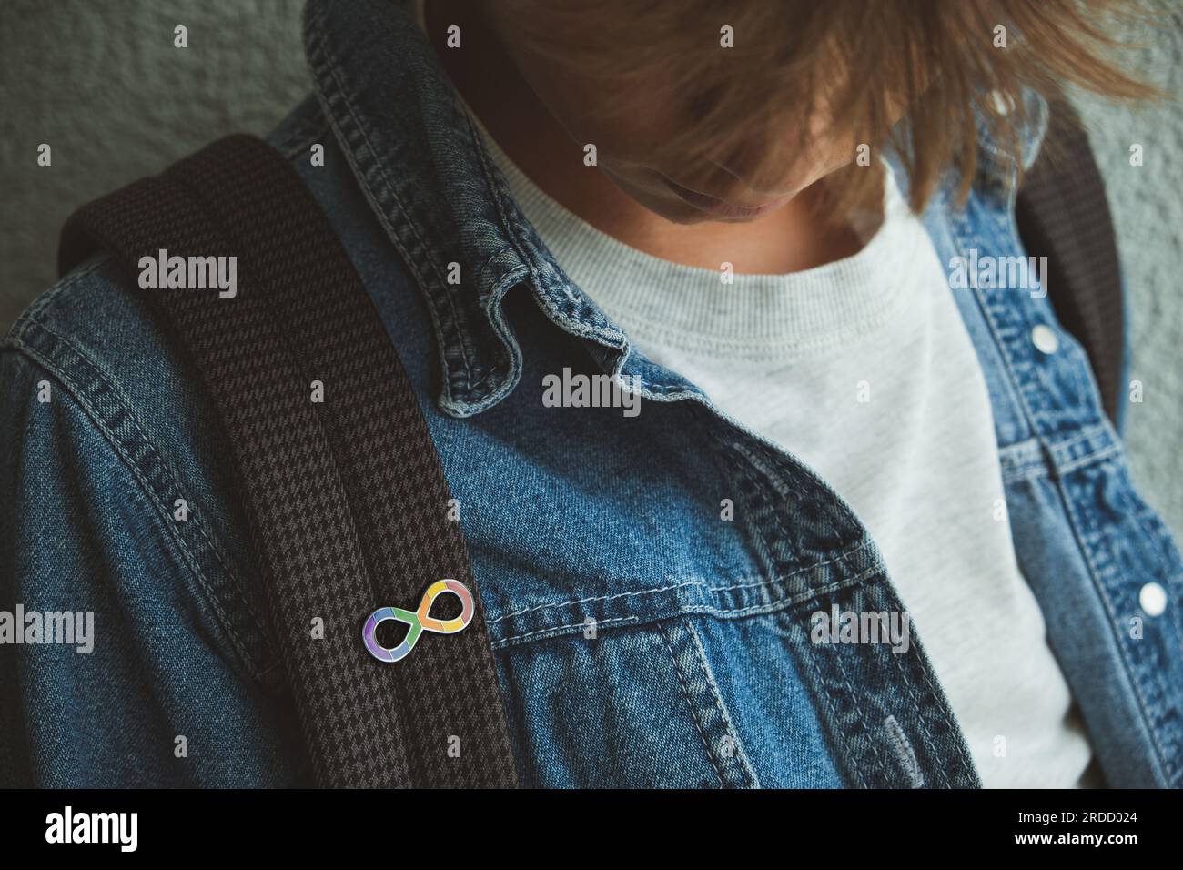 Young boy with autism infinity rainbow symbol sign. World autism ...