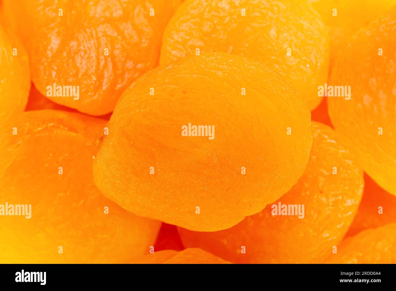 Texture of tasty dried apricots as background Stock Photo - Alamy