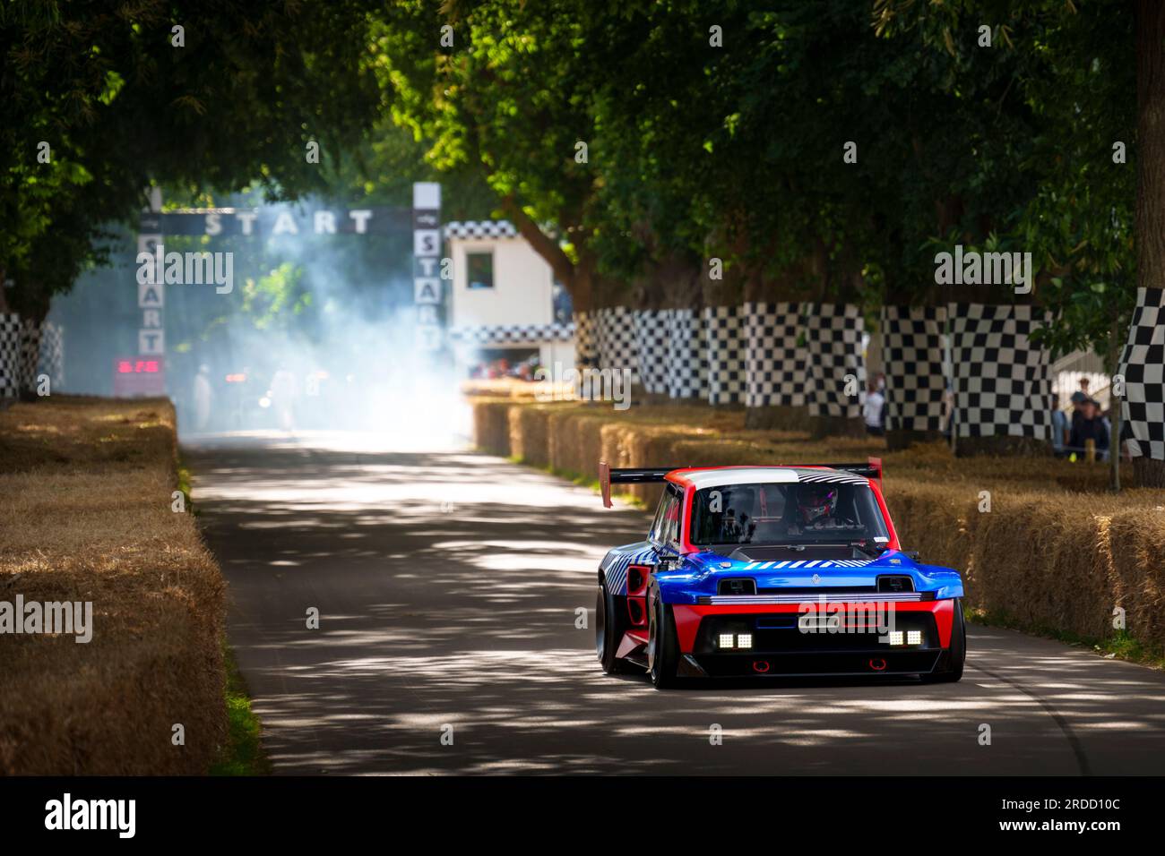 Renault R5 Turbo 3E E-Tech powering up the hill at the Goodwood ...