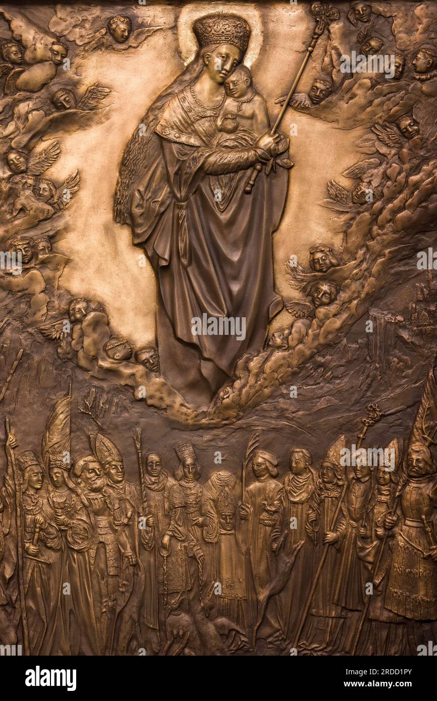 Bas-relief depicting the Mother of God with the Child and the saints ...