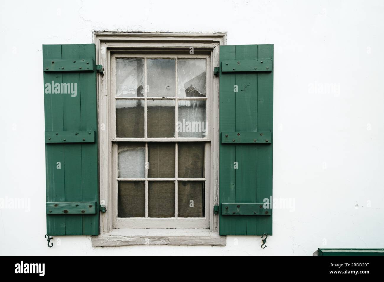Green shutters on a window - oldest house St. Augustine Florida. White ...