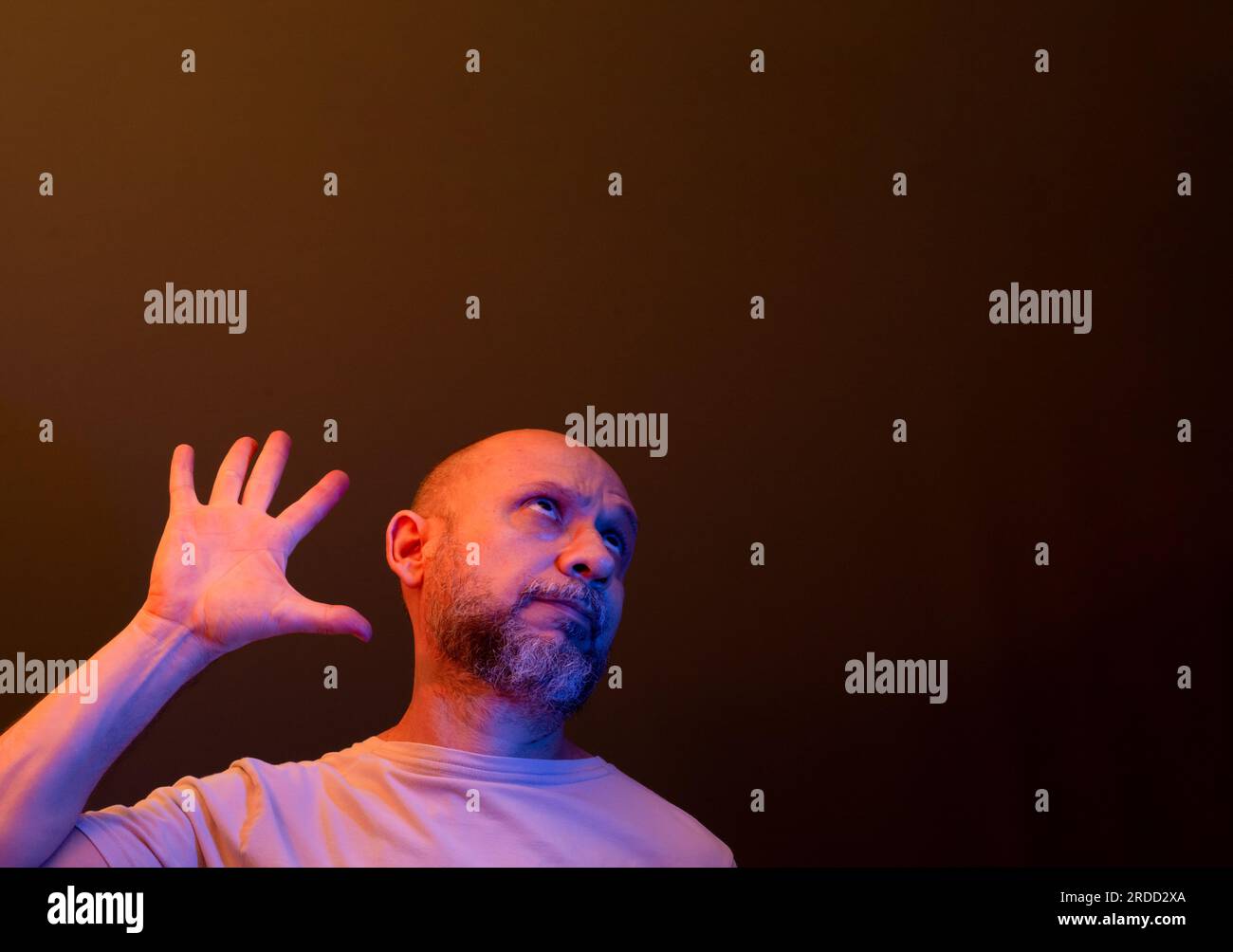 Happy Bald Bearded Man Making Funny Hand Gestures Concept Of Strength