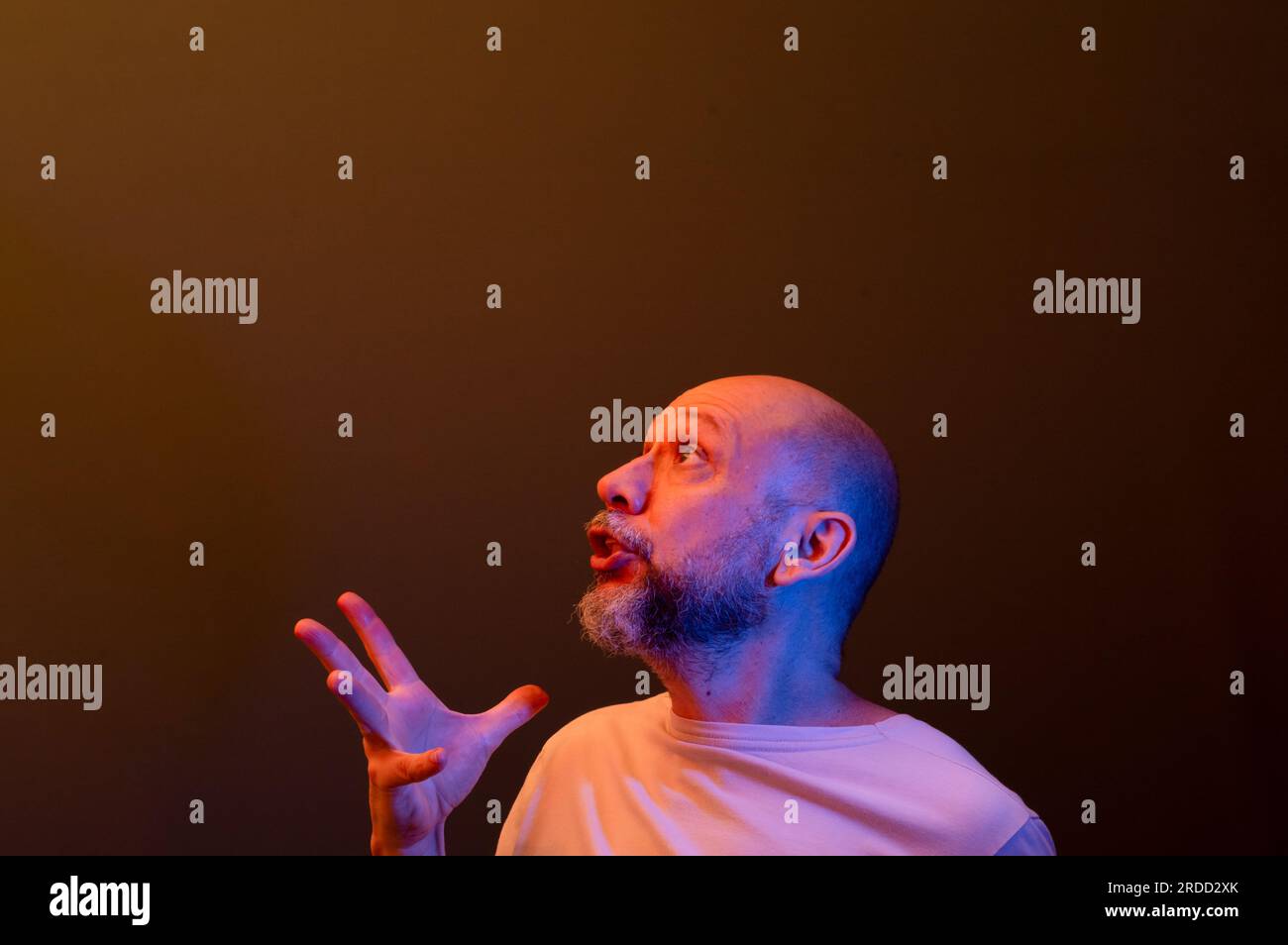Happy Bald Bearded Man Making Funny Hand Gestures Concept Of Strength