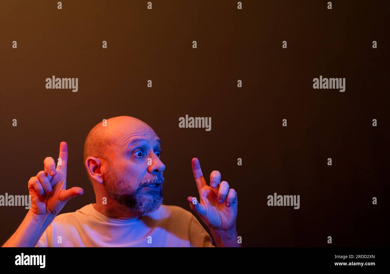 Happy Bald Bearded Man Making Funny Hand Gestures Concept Of Strength