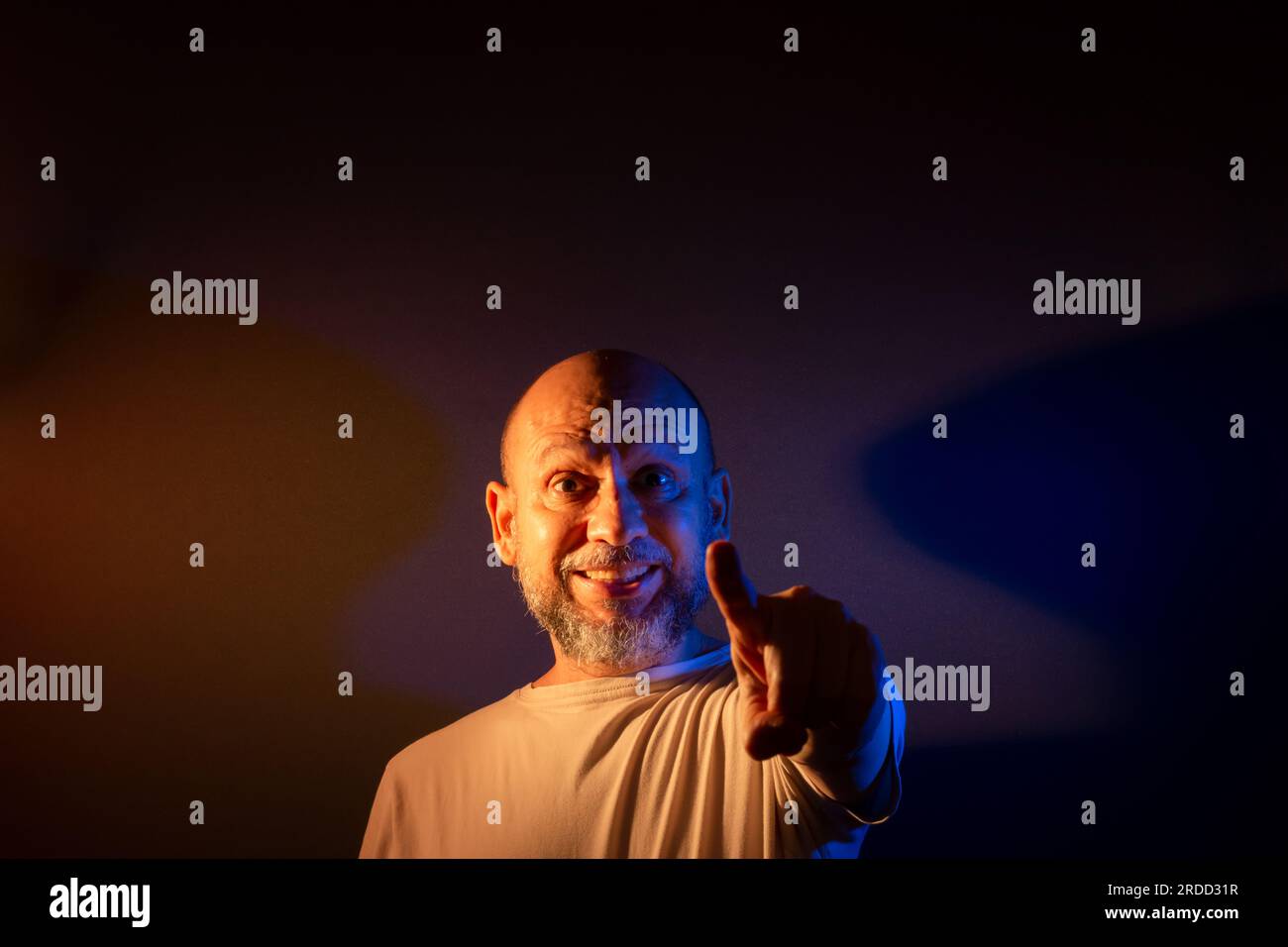 Funny bearded bald man doing different expressions and gestures. Happy ...