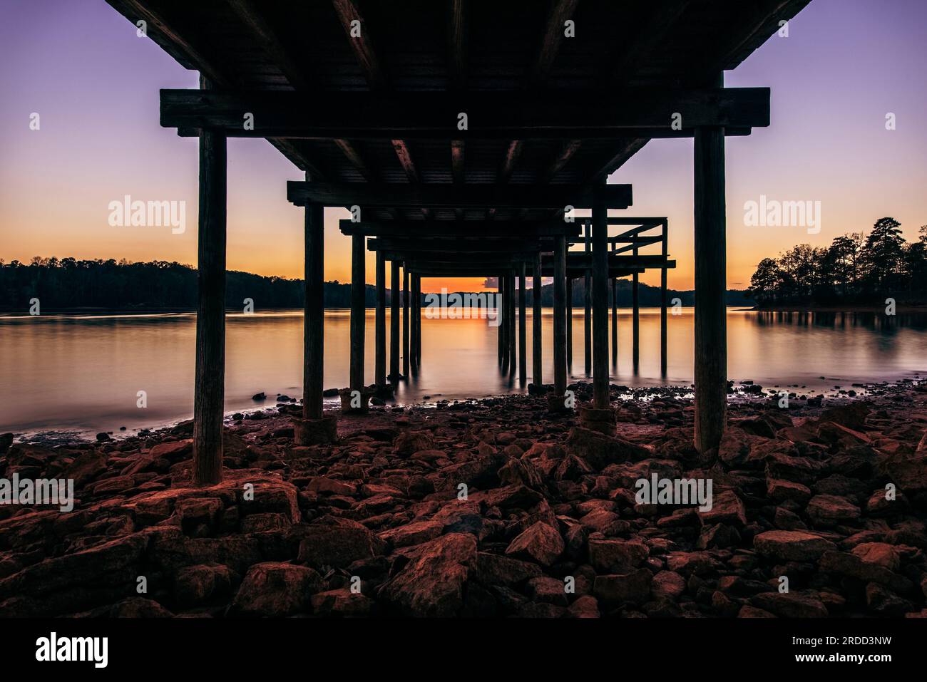 Reflected sunset colors on the surface of Lake Lanier viewed from ...