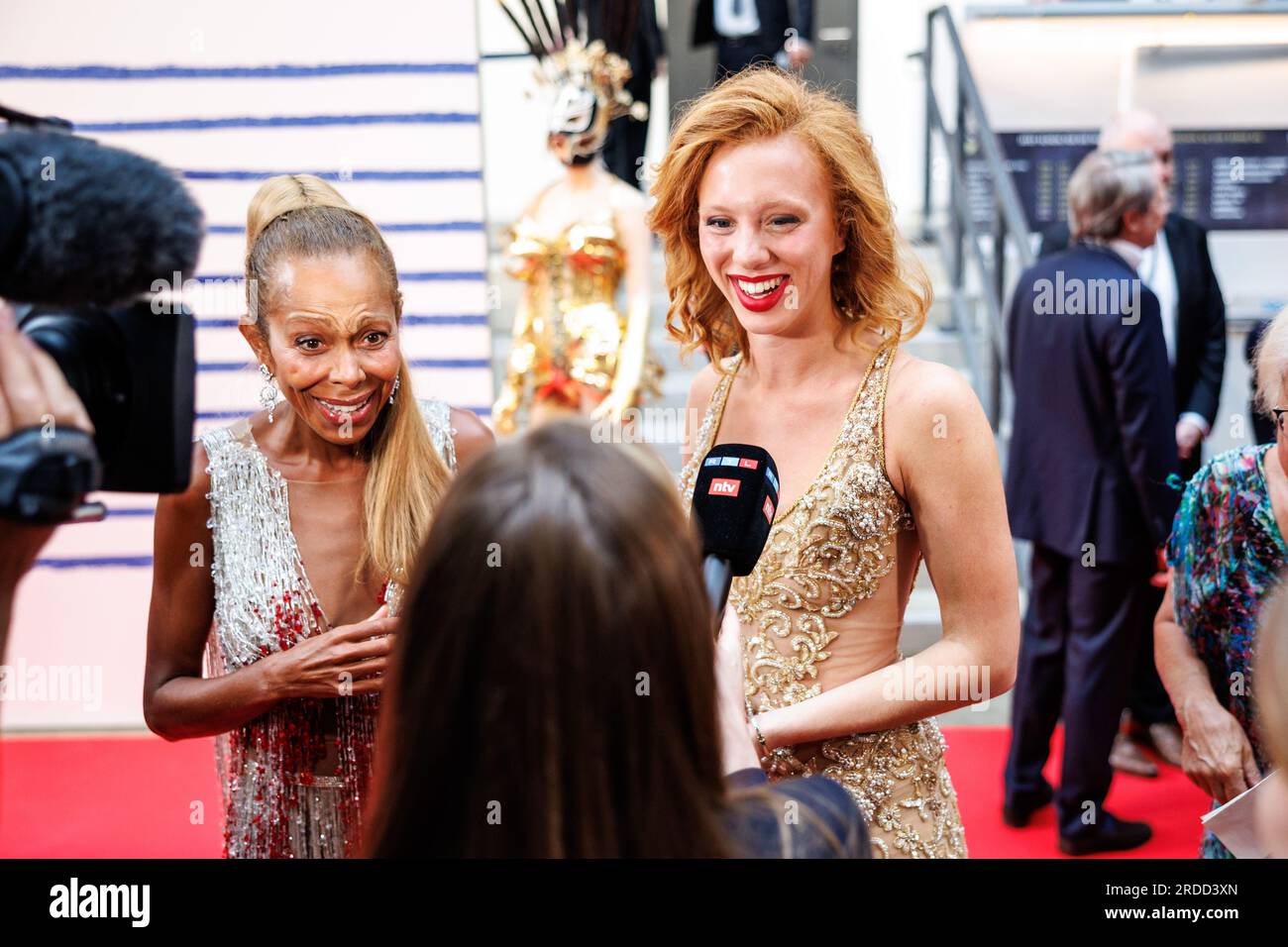 Munich, Germany. 20th July, 2023. Anna Ermakova (r) gives an interview ...
