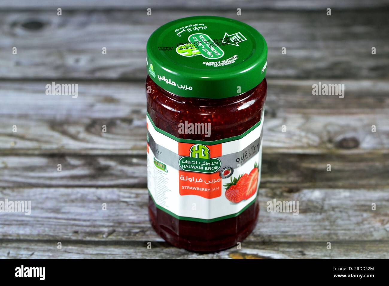 Cairo, Egypt, July 9 2023: Halwani Bros strawberry jam Haalwani bottle ...