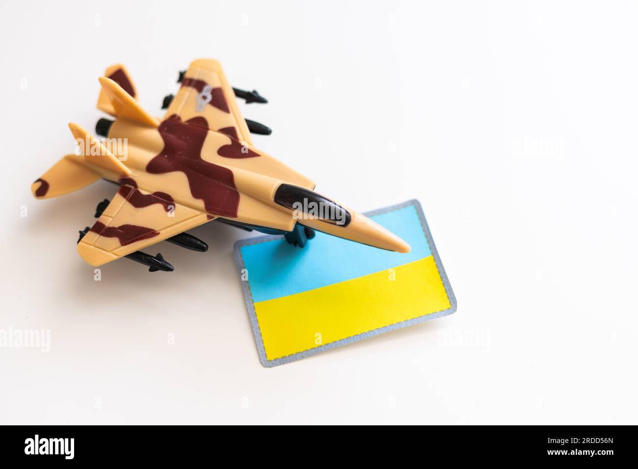 Plastic toy military jet plane on white background Stock Photo - Alamy