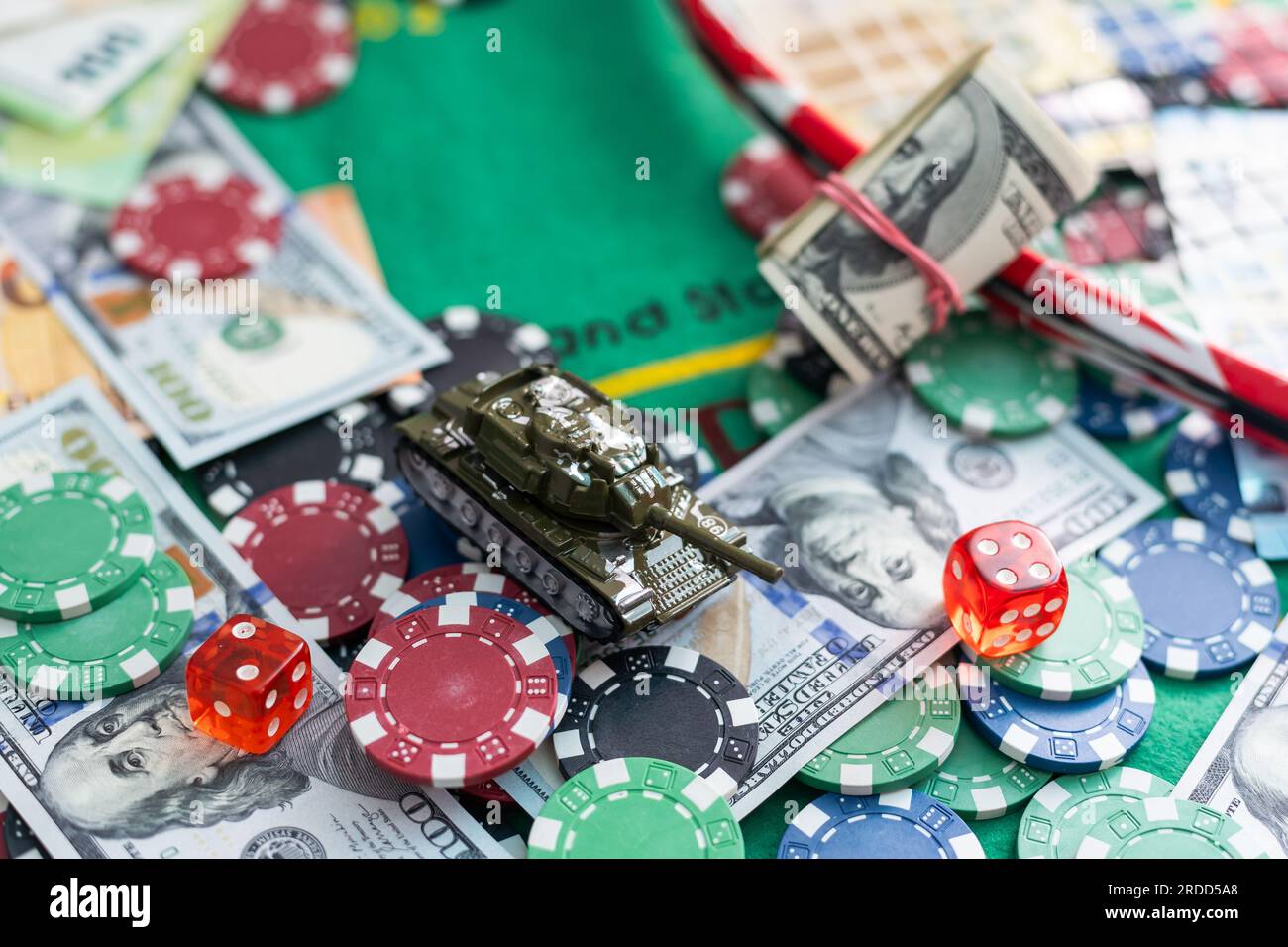 gamble. Poker concept.playing cards, chips and dollars are scattered ...