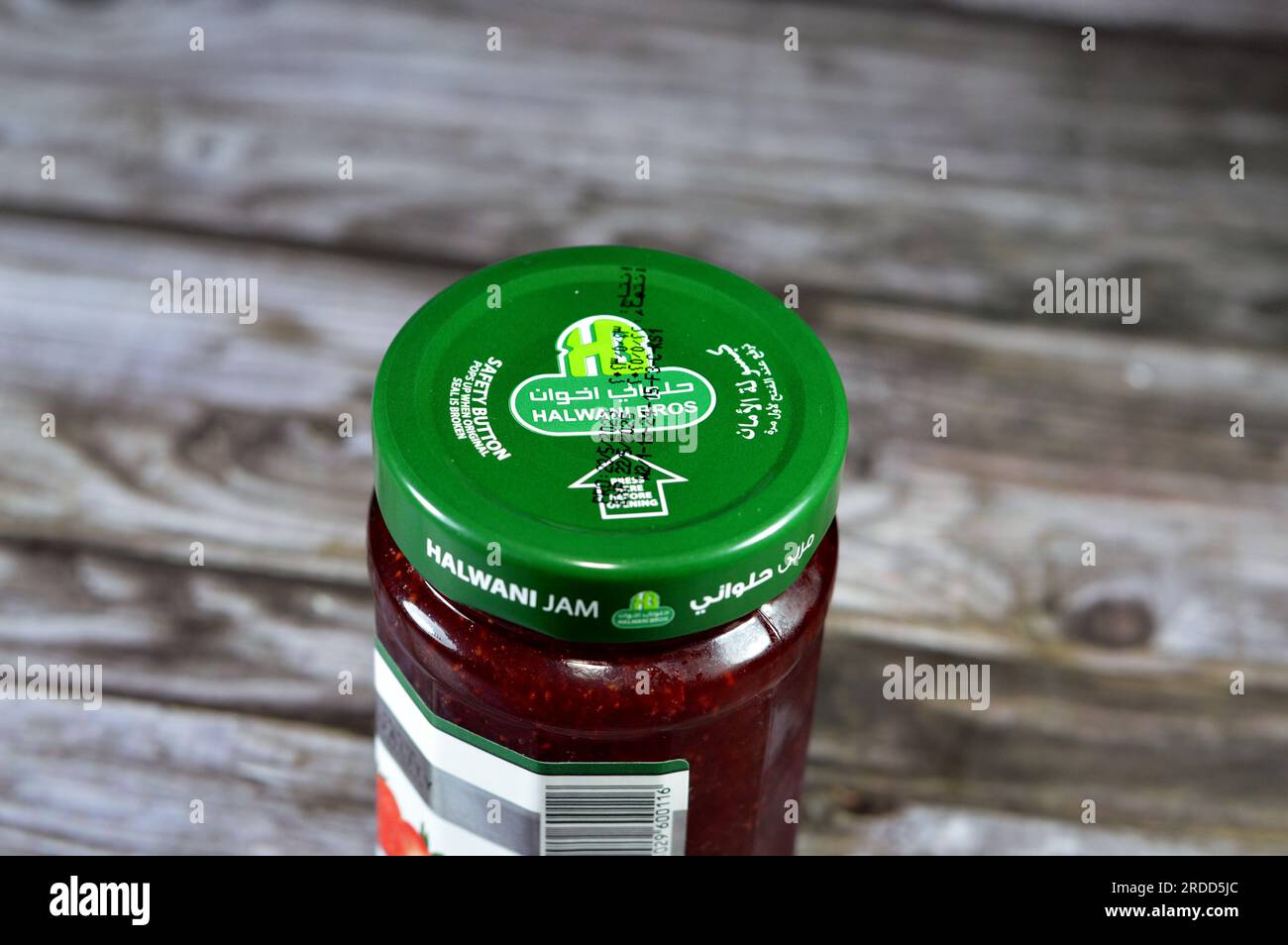 Cairo, Egypt, July 9 2023: Halwani Bros strawberry jam Haalwani bottle ...