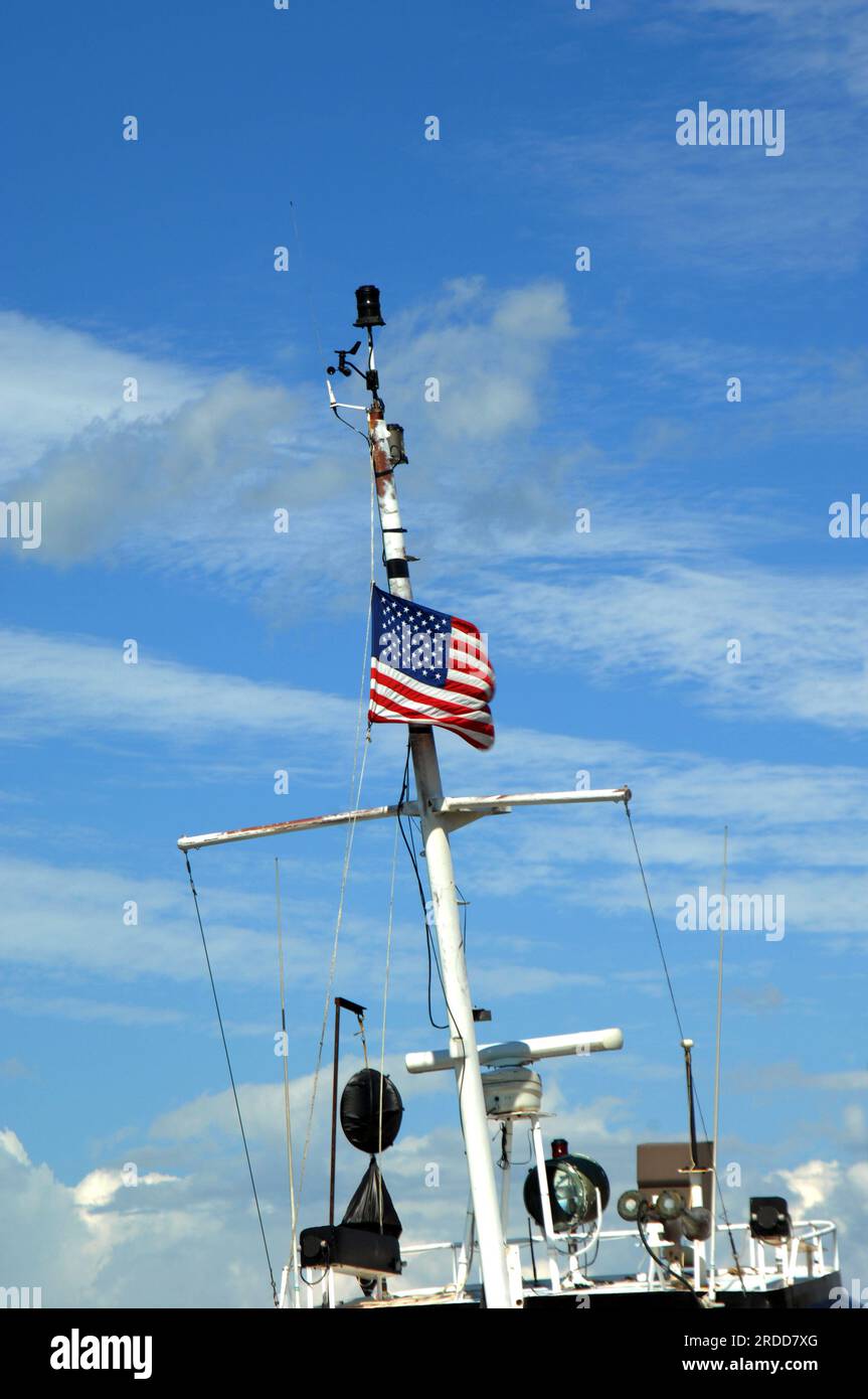 Tugboat Flag Pole displays the American Flag as it sits along the ...