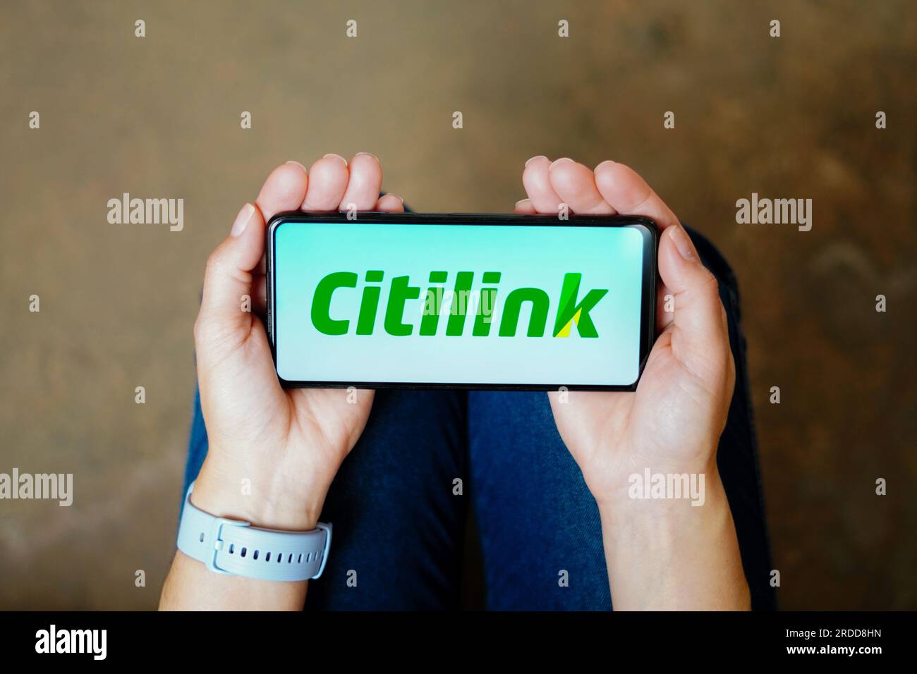 In this photo illustration, the Citilink Indonesia logo seen displayed ...