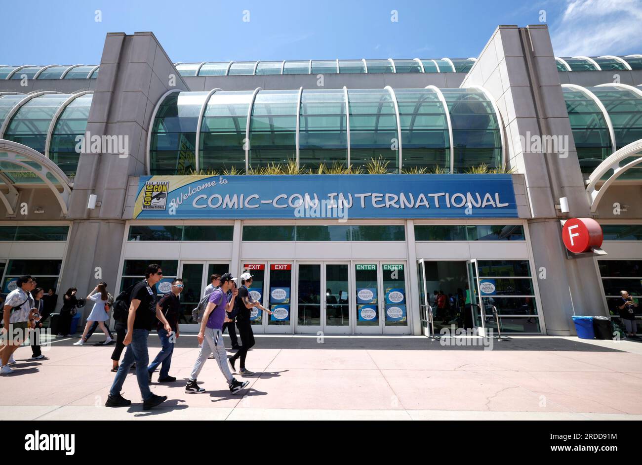 Guests walk outside the convention center at Comic-Con International on ...