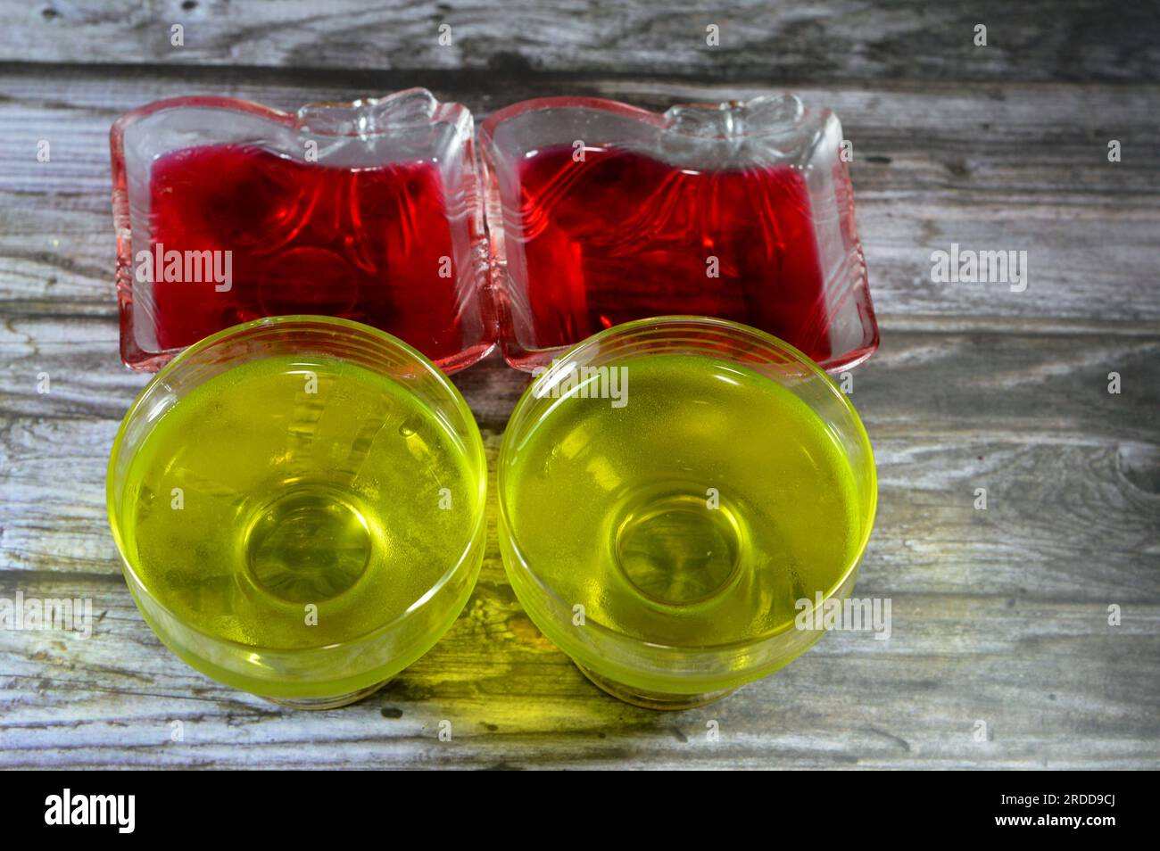 Delicious sweet green and red jelly pudding pineapple and strawberry ...