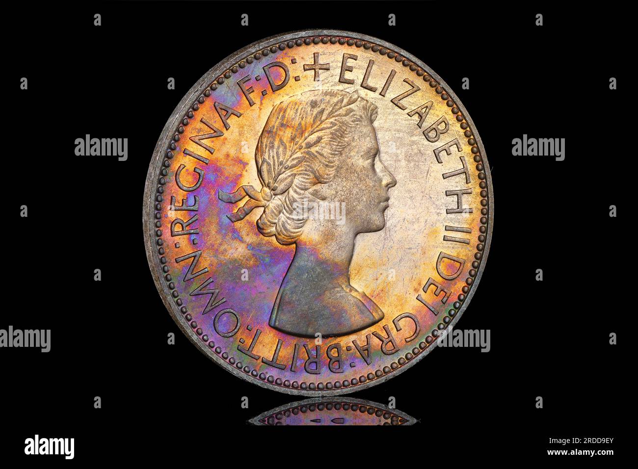 1953 One Penny with rainbow toning. The obverse features the first coin ...