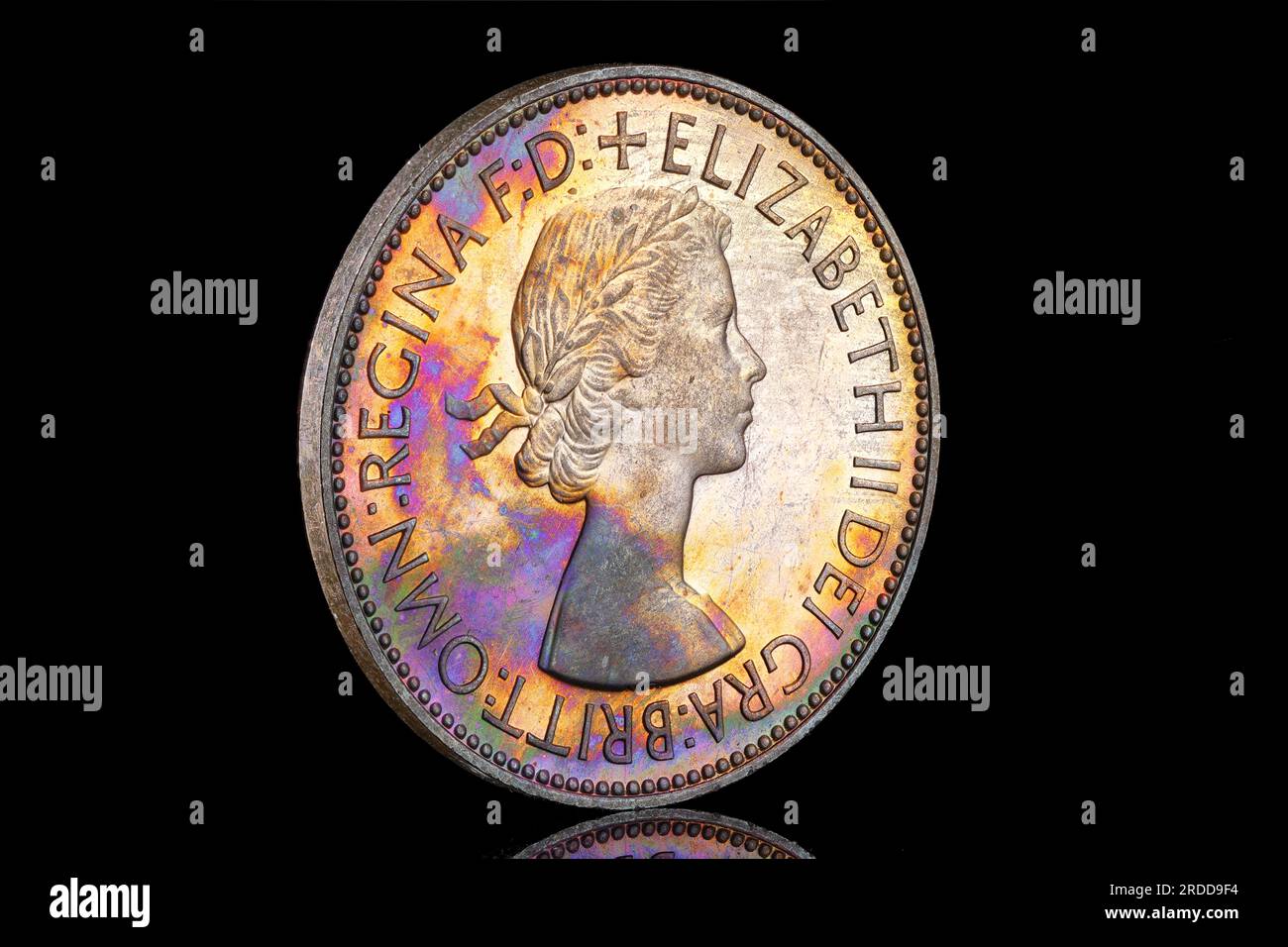 1953 One Penny with rainbow toning. The obverse features the first coin ...