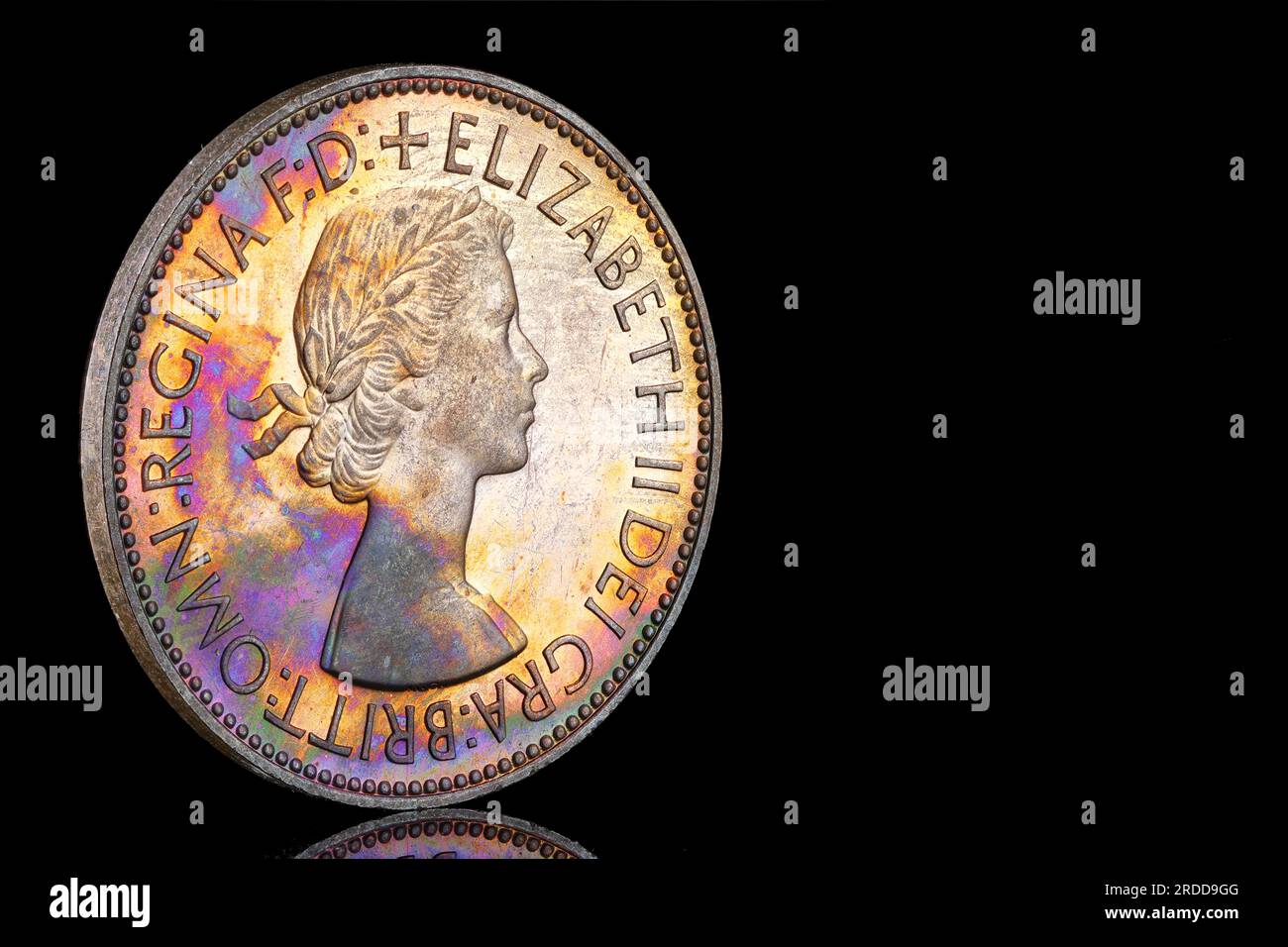 1953 One Penny with rainbow toning. The obverse features the first coin ...