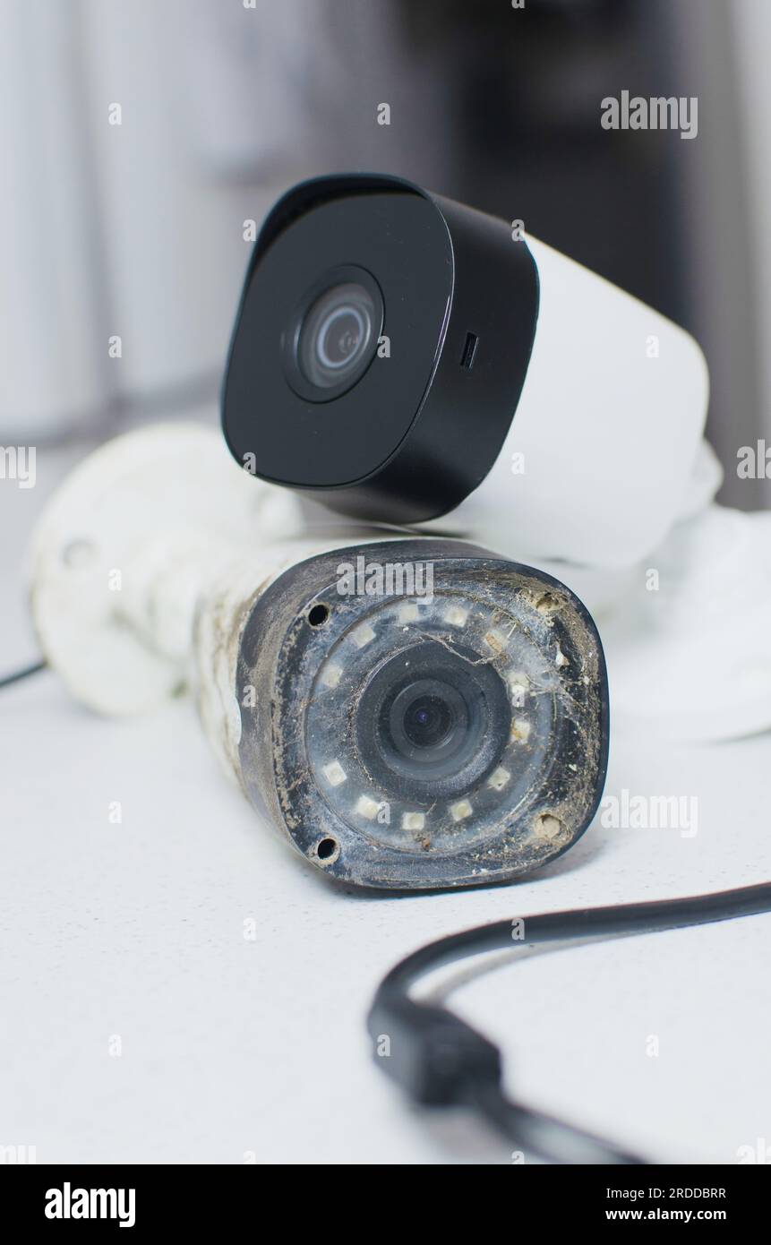 Detail of an old and neglected security camera, highlighting the ...