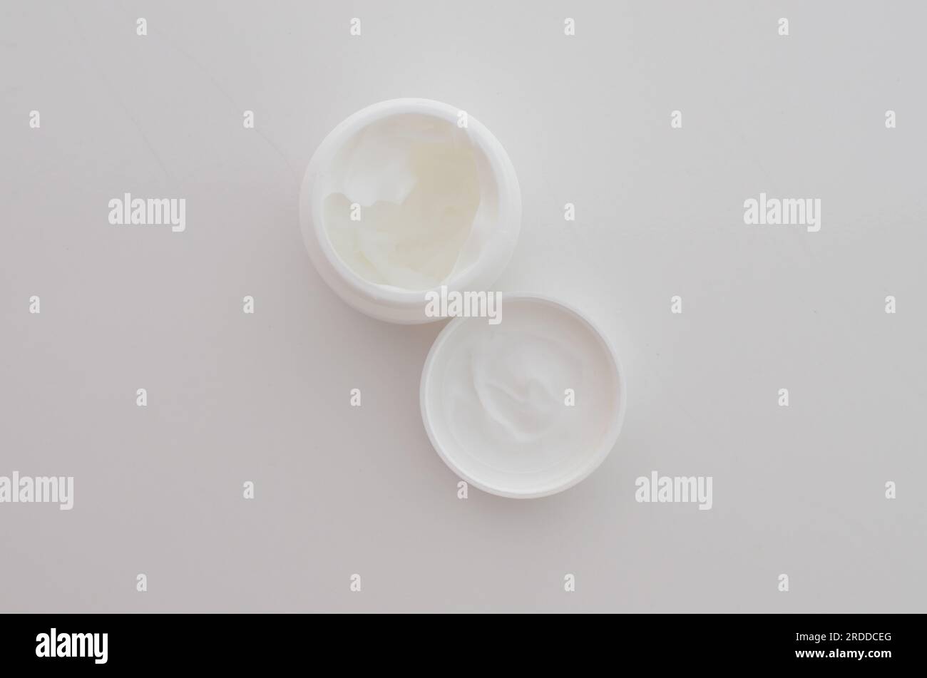 Small bottle of white cream, representing the importance of aesthetics ...