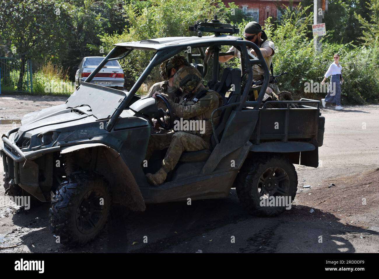 Ukrainian army soldiers are seen on a combat buggy in Tavriiske ...