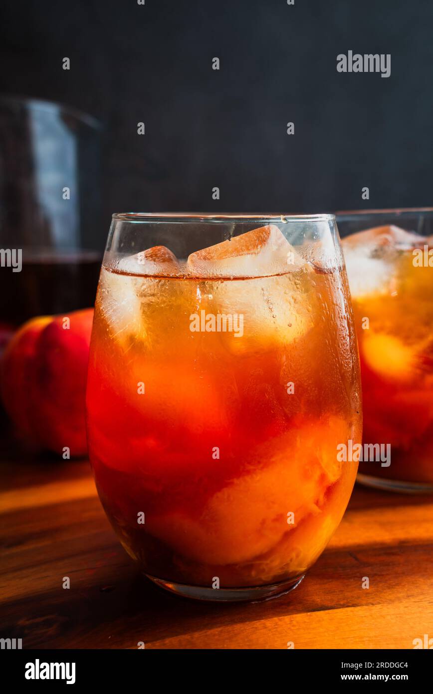 Glasses of Vietnamese Peach Iced Tea (Trà Dào): Iced tea served with ...