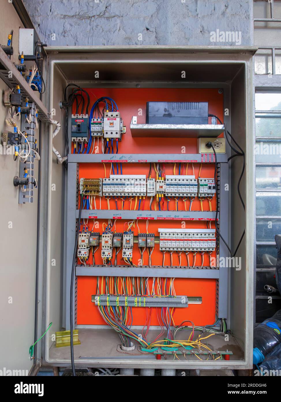 Close-up view of the complex circuit box of a car shop with the ...