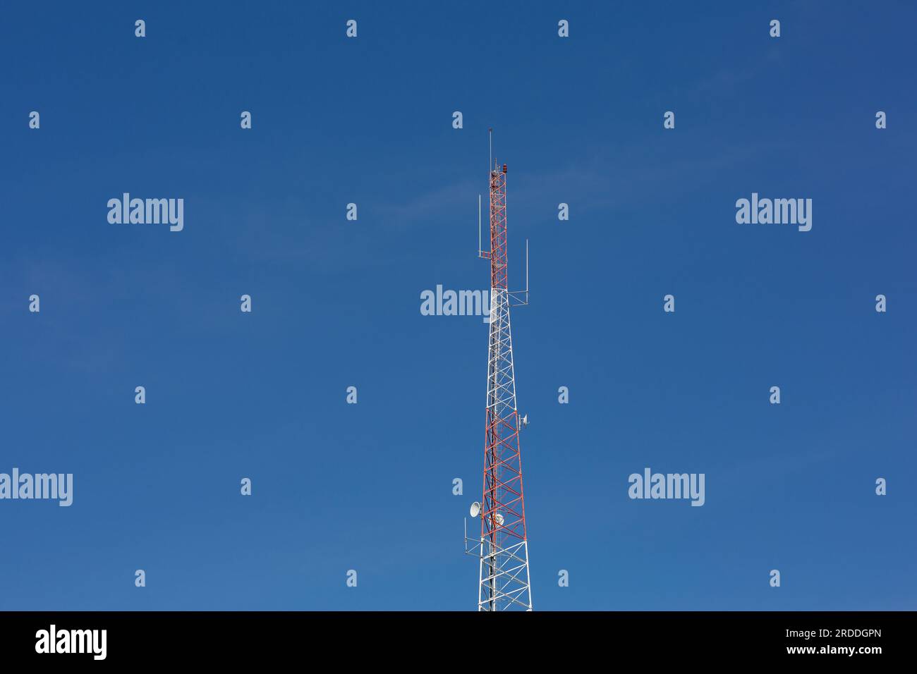 Telecommunication tower and sky blue Stock Photo - Alamy