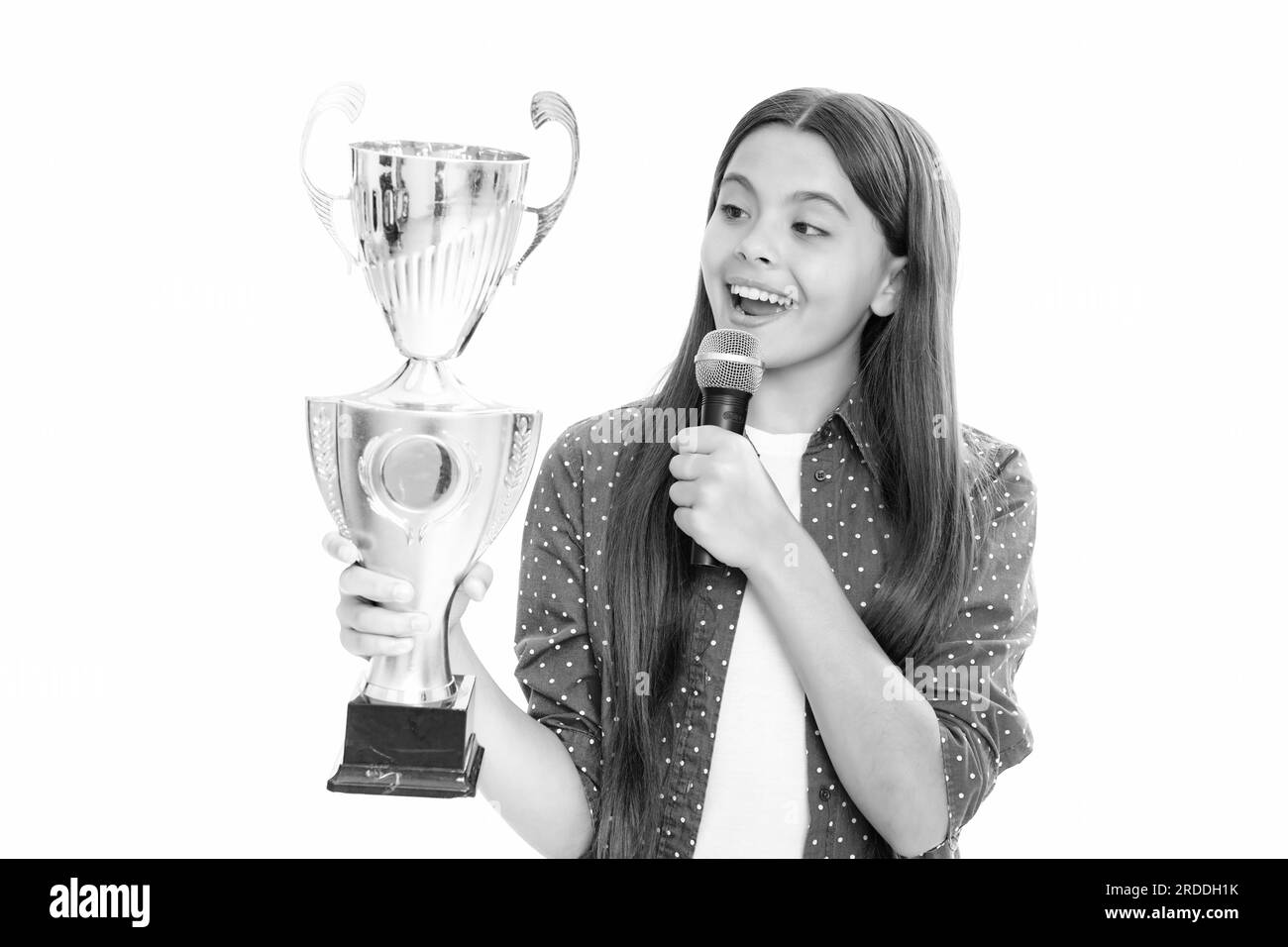Teenager girl with win cup. Teen holding a trophy microphone speech ...