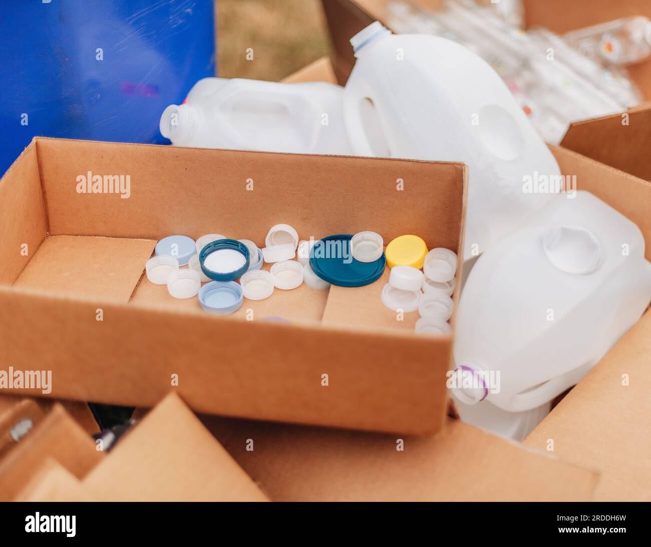 Recycling and environmentally friendly, bottle caps in card board box ...