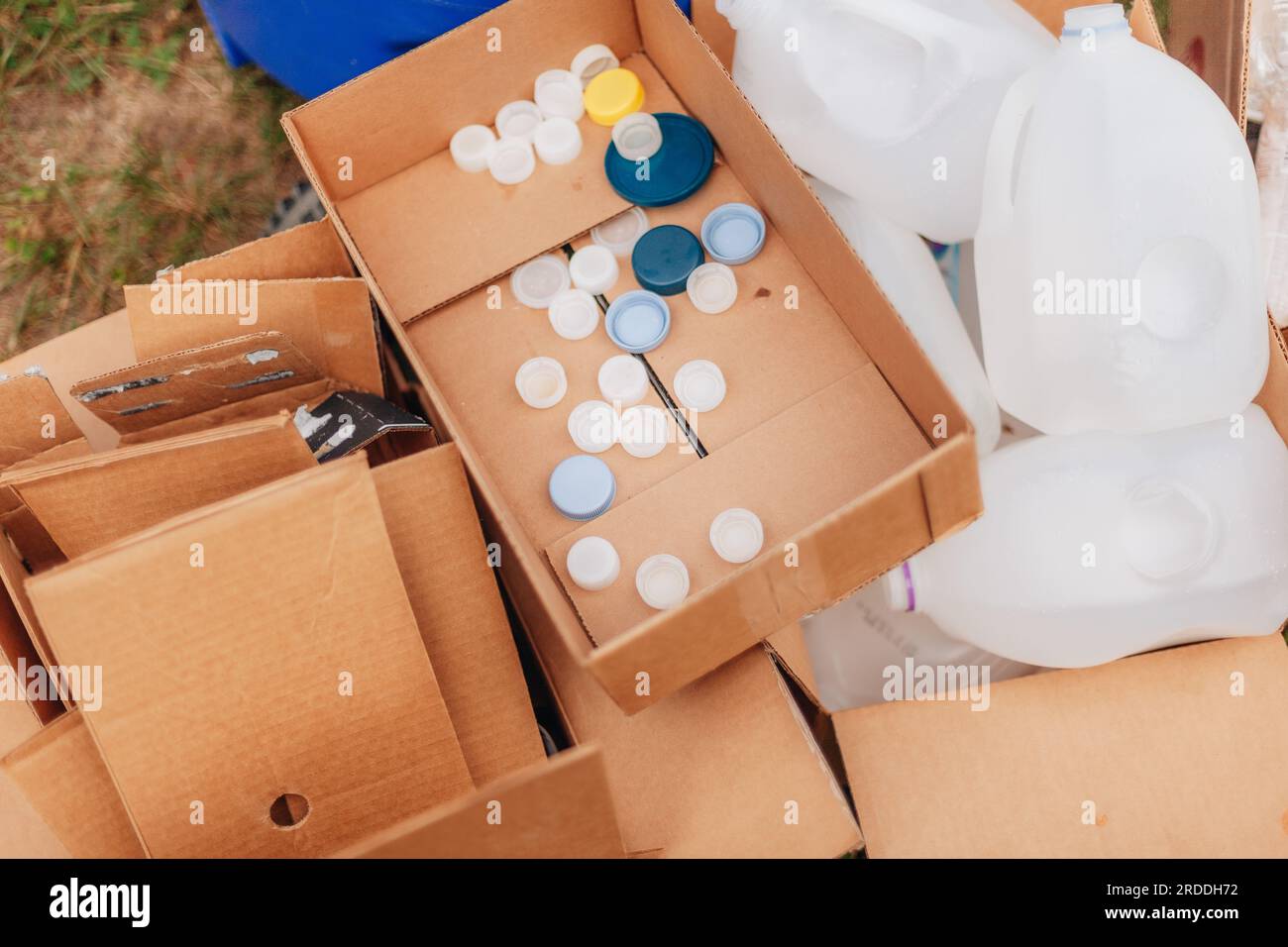 Recycling and environmentally friendly, bottle caps in card board box ...