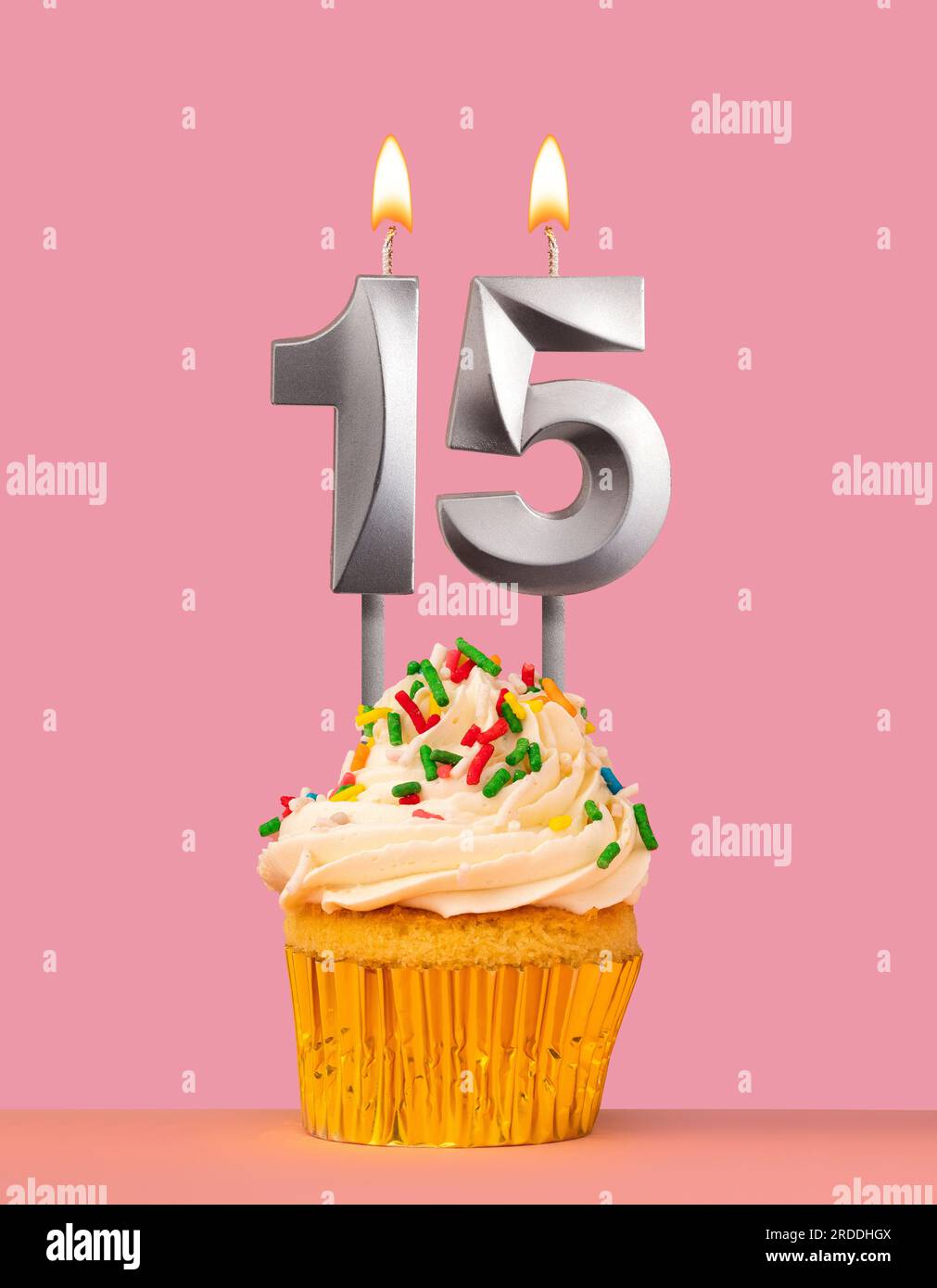 Birthday card with cupcake and candle number 15 Stock Photo - Alamy