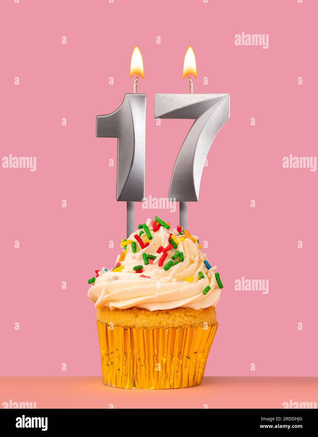 Birthday card with cupcake and candle number 17 Stock Photo - Alamy