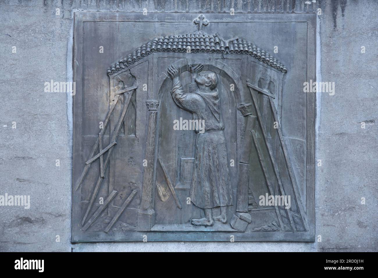 Relief of Saint Francis with symbol for the construction of the church ...