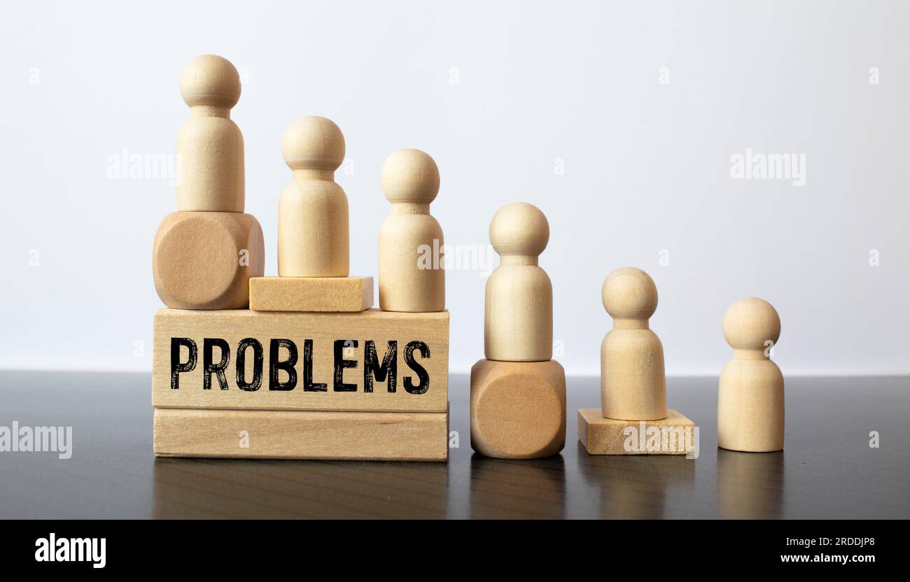 Wooden elements with letter on wooden table spelling word problem ...