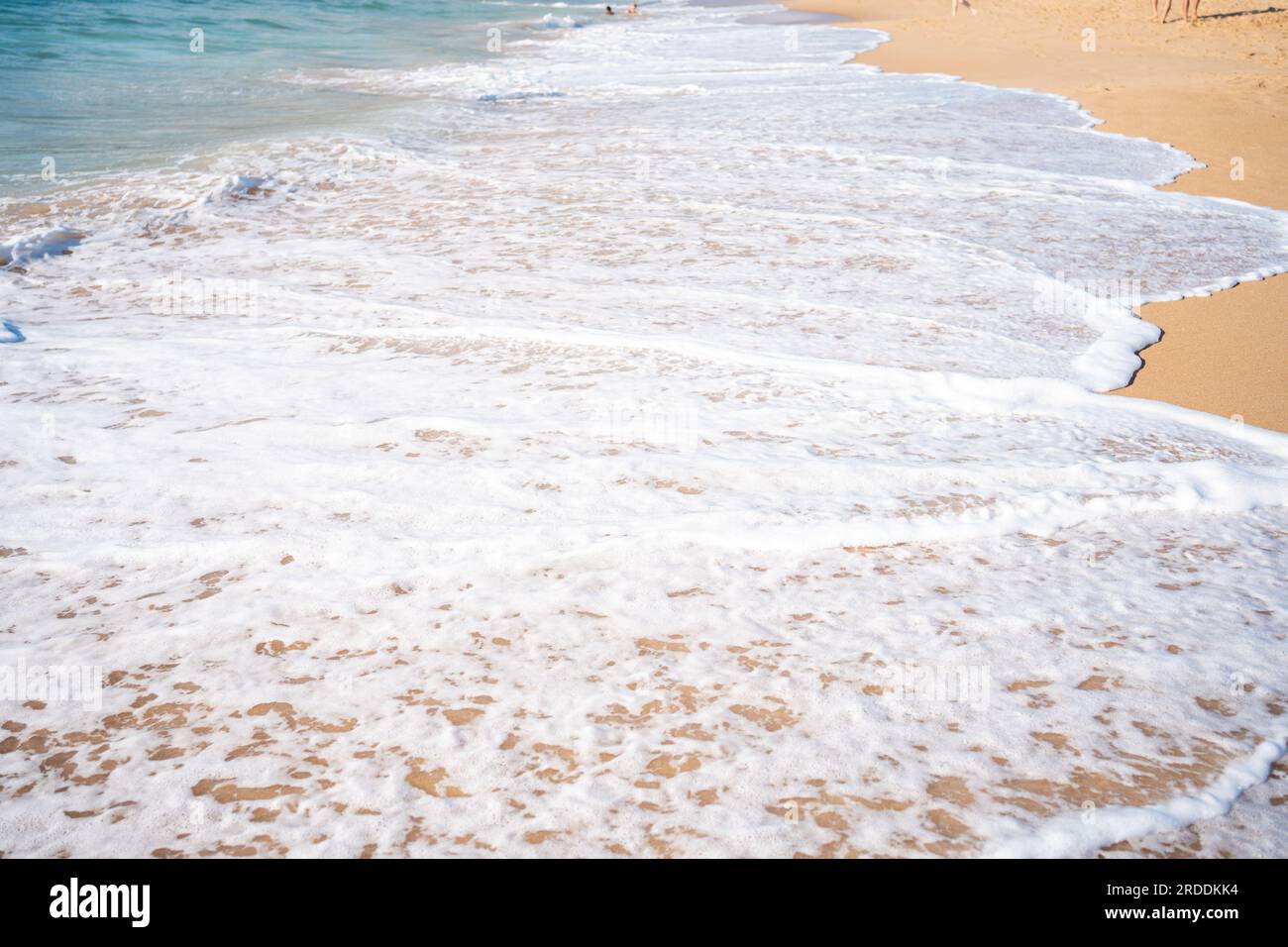 Soft beautiful ocean wave on sandy beach. Background. Turquoise color ...