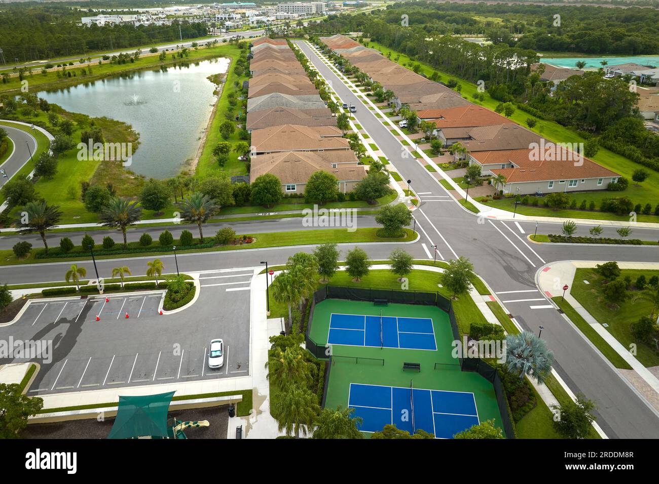 Aerial view of blue tennis courts for sports recreational activity ...