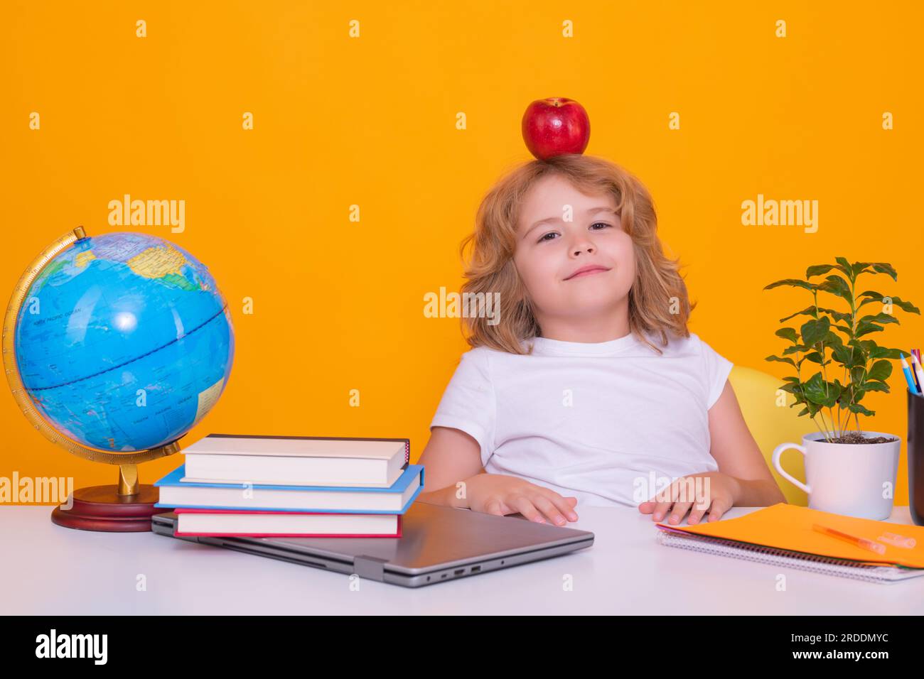 Funny pupil with apple an head. Little student school child isolated on ...