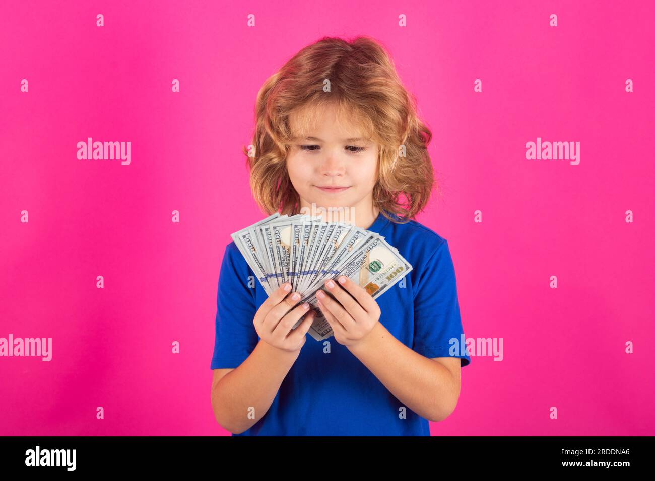 Studio portrait of child with money banknotes. Kid with money for ...