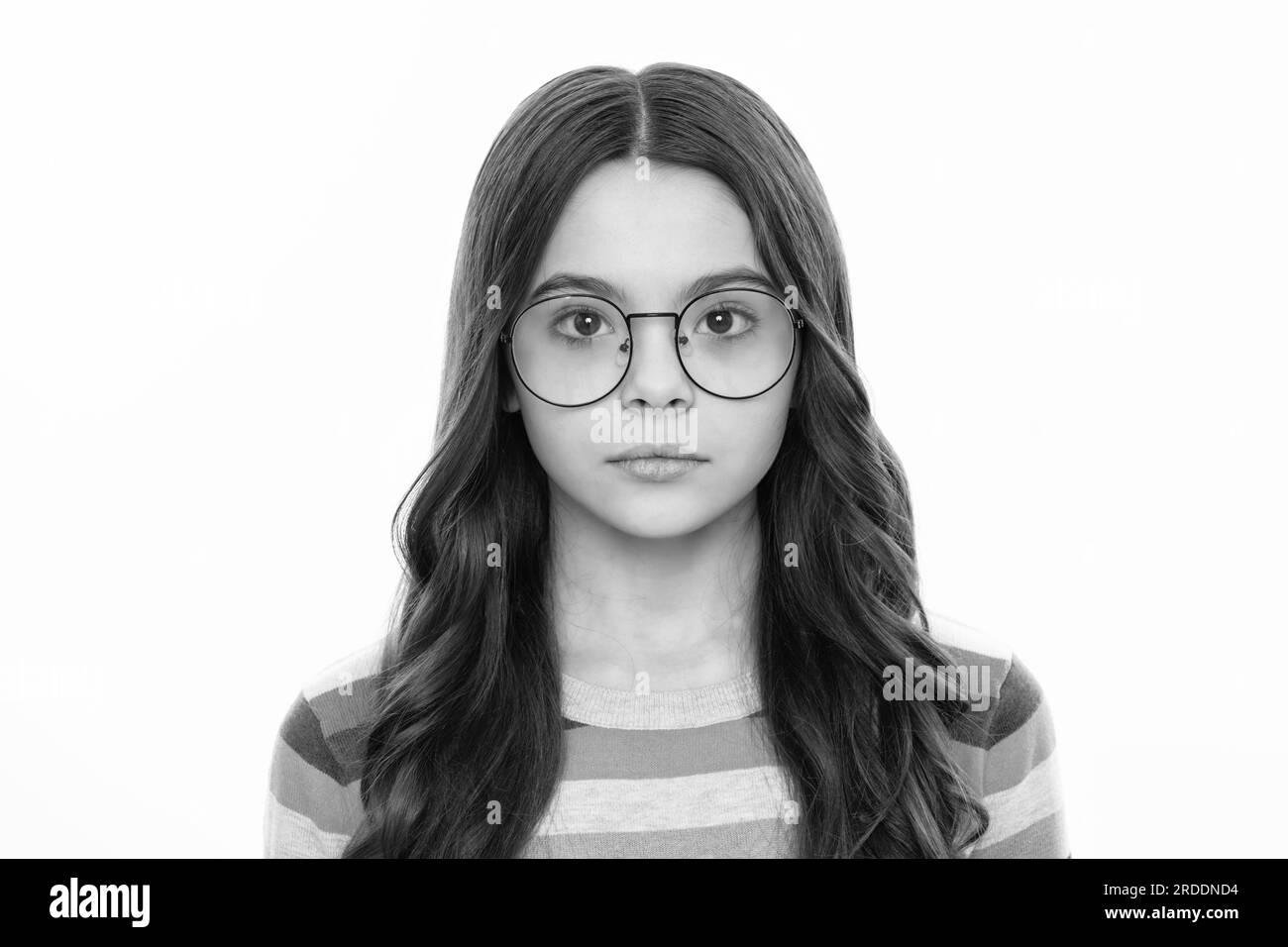 Portrait of cute smart clever little girl isolated on yellow background ...