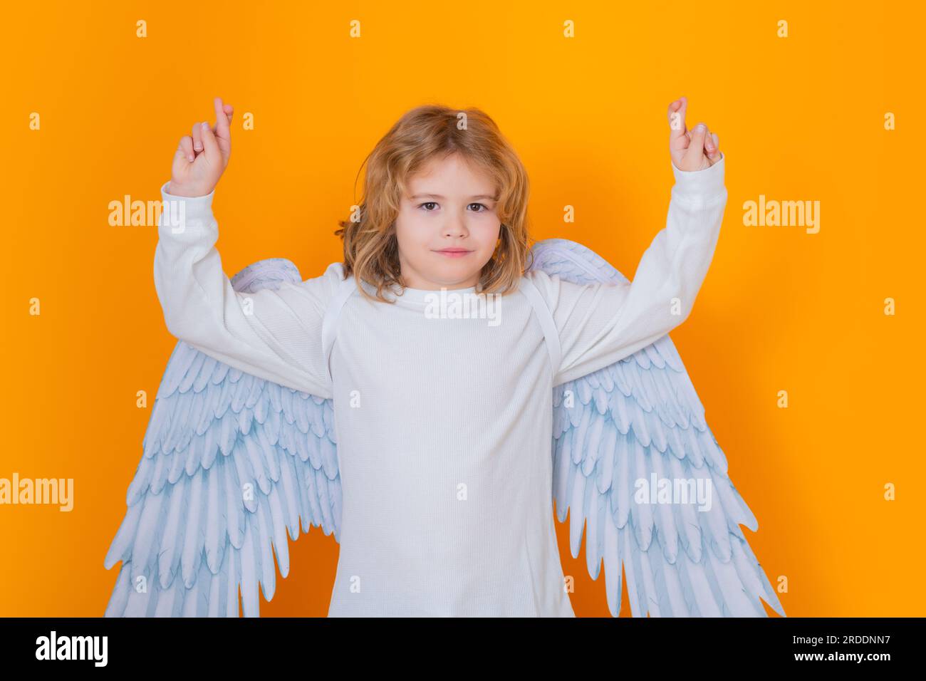 Child angel crossed fingers with lucky and hope, good luck. Cute angel ...
