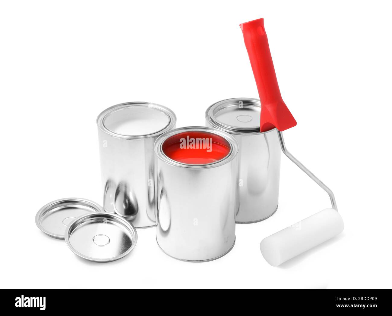 Cans of color paints and roller on white background Stock Photo - Alamy