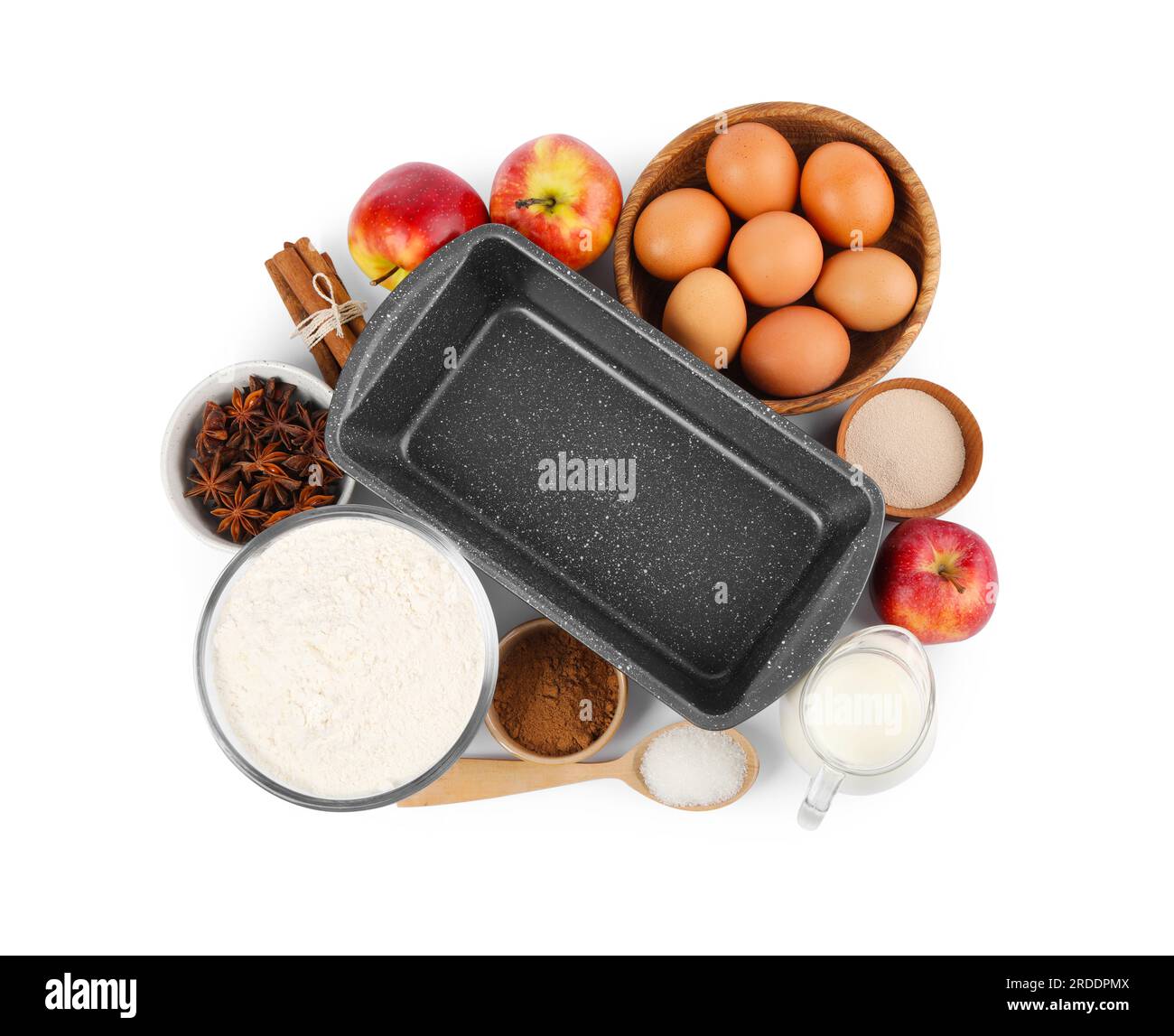 Empty baking tray and different ingredients on white background, top ...