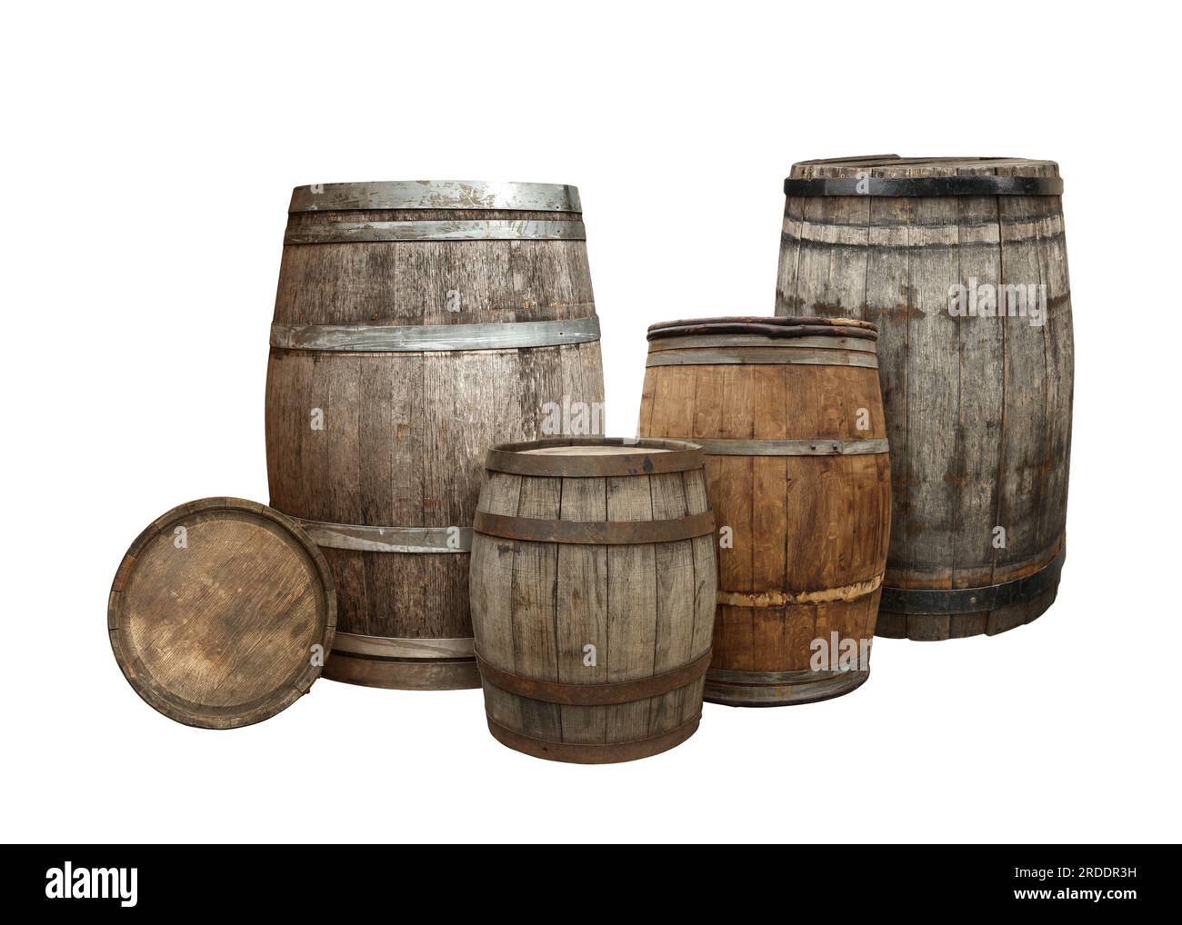 Many different wooden barrels on white background Stock Photo - Alamy