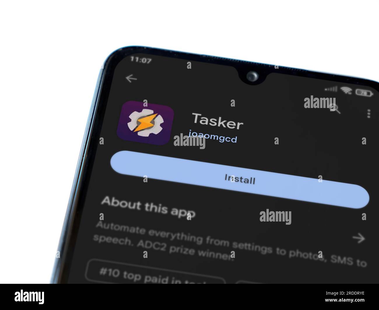 Lod, Israel - July 16,2023: Tasker app play store page on smartphone on white background. Top ...