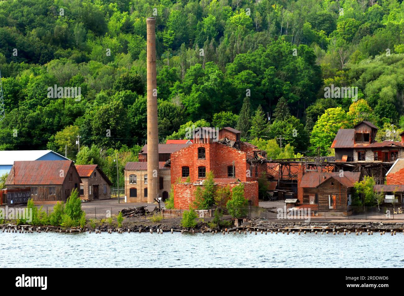 Buildings and smoke stack of the Quincy Copper Smelter in Upper ... Buildings and smoke stack of the Quincy Copper Smelter in Upper ...