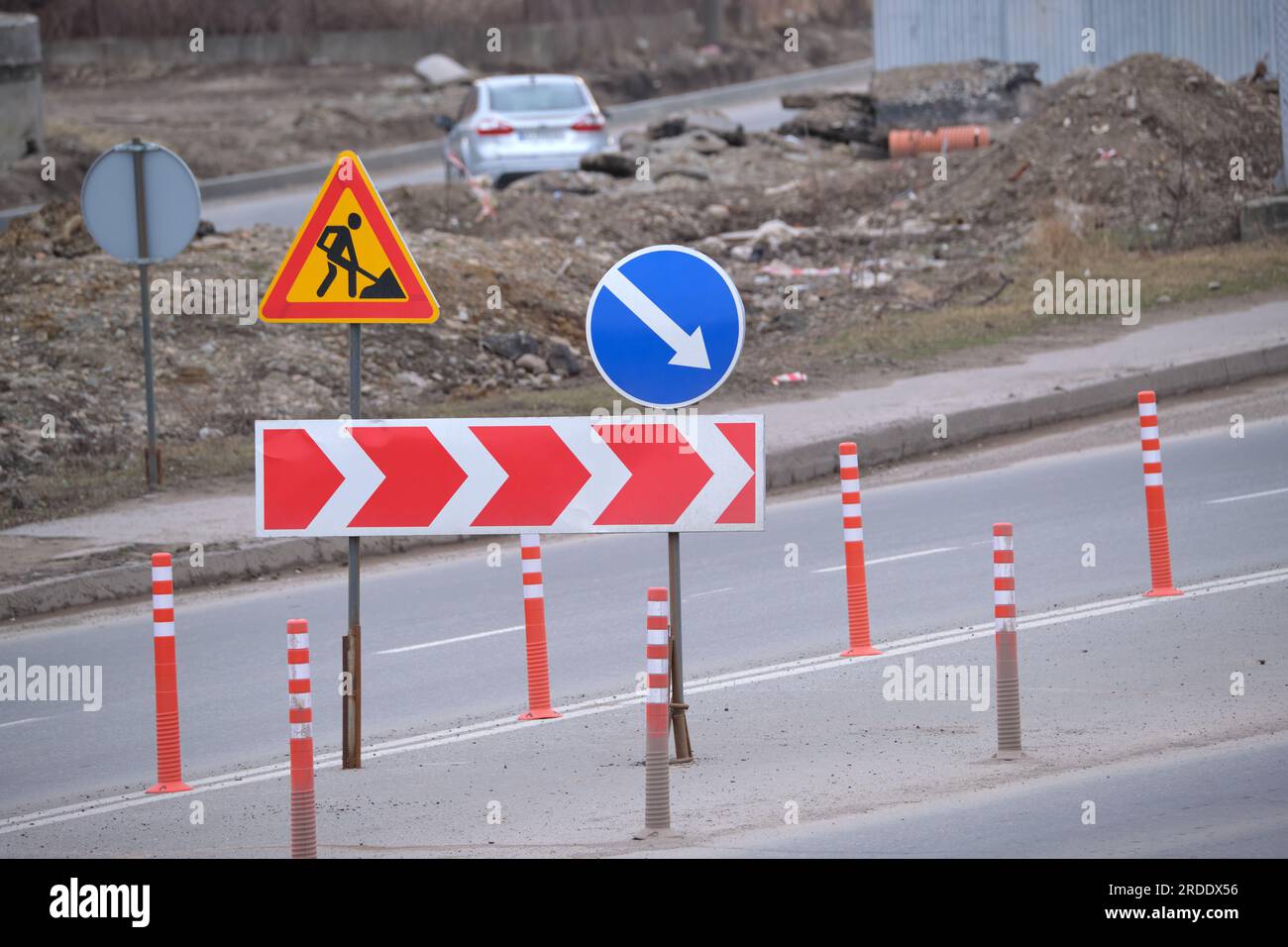 Roadworks warning traffic signs of construction work on city street ...